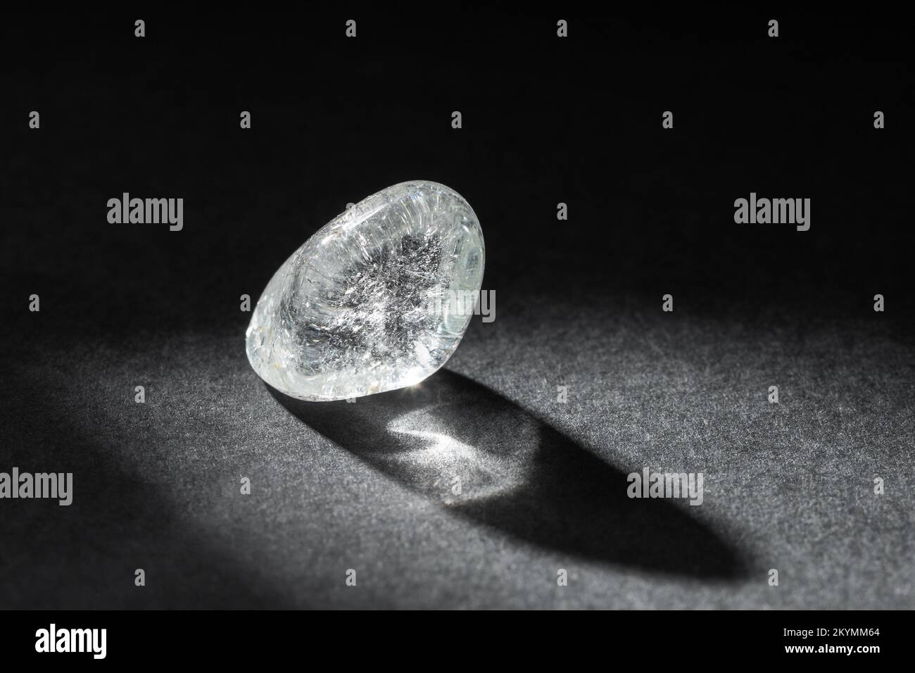 Polished Pale Blue Topaz Mineral Stone on Dark Background. Topaz is ...