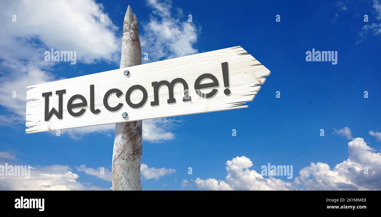 Welcome - wooden signpost with one arrow Stock Photo - Alamy