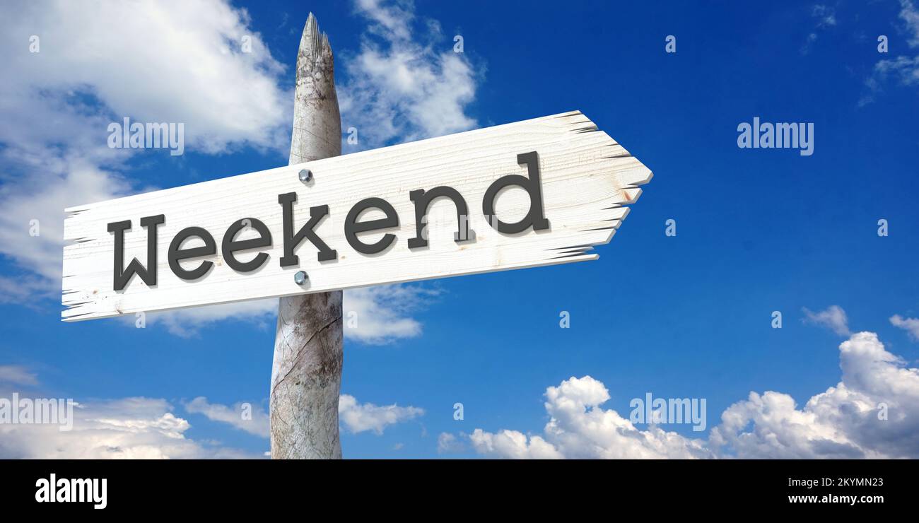 Weekend - wooden signpost with one arrow Stock Photo - Alamy