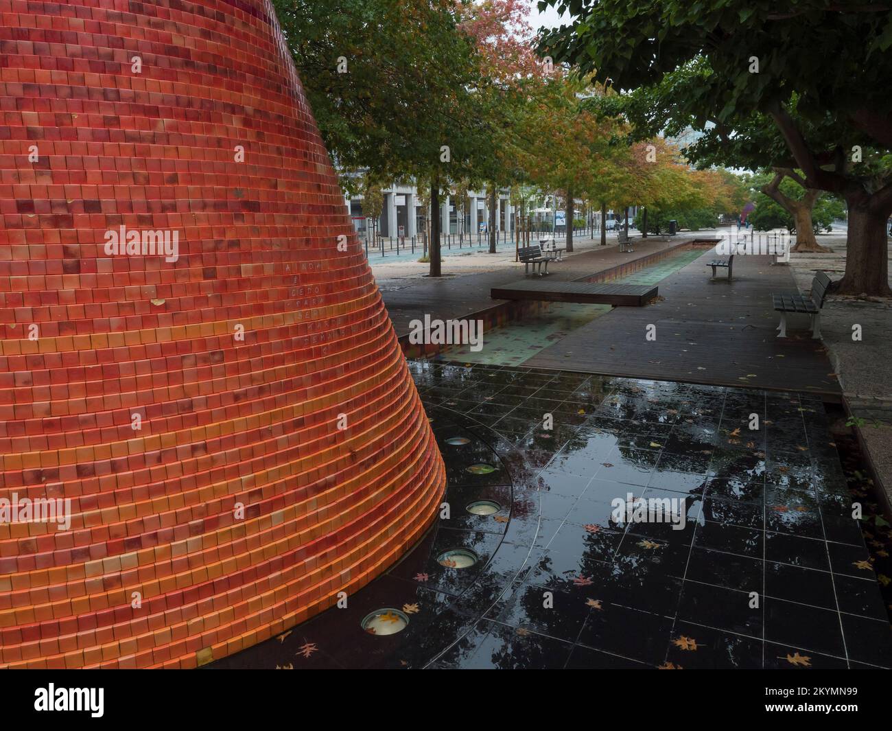 Lisbon, Portugal, October 30, 2021: tree alley and water fontain Vulcao ...