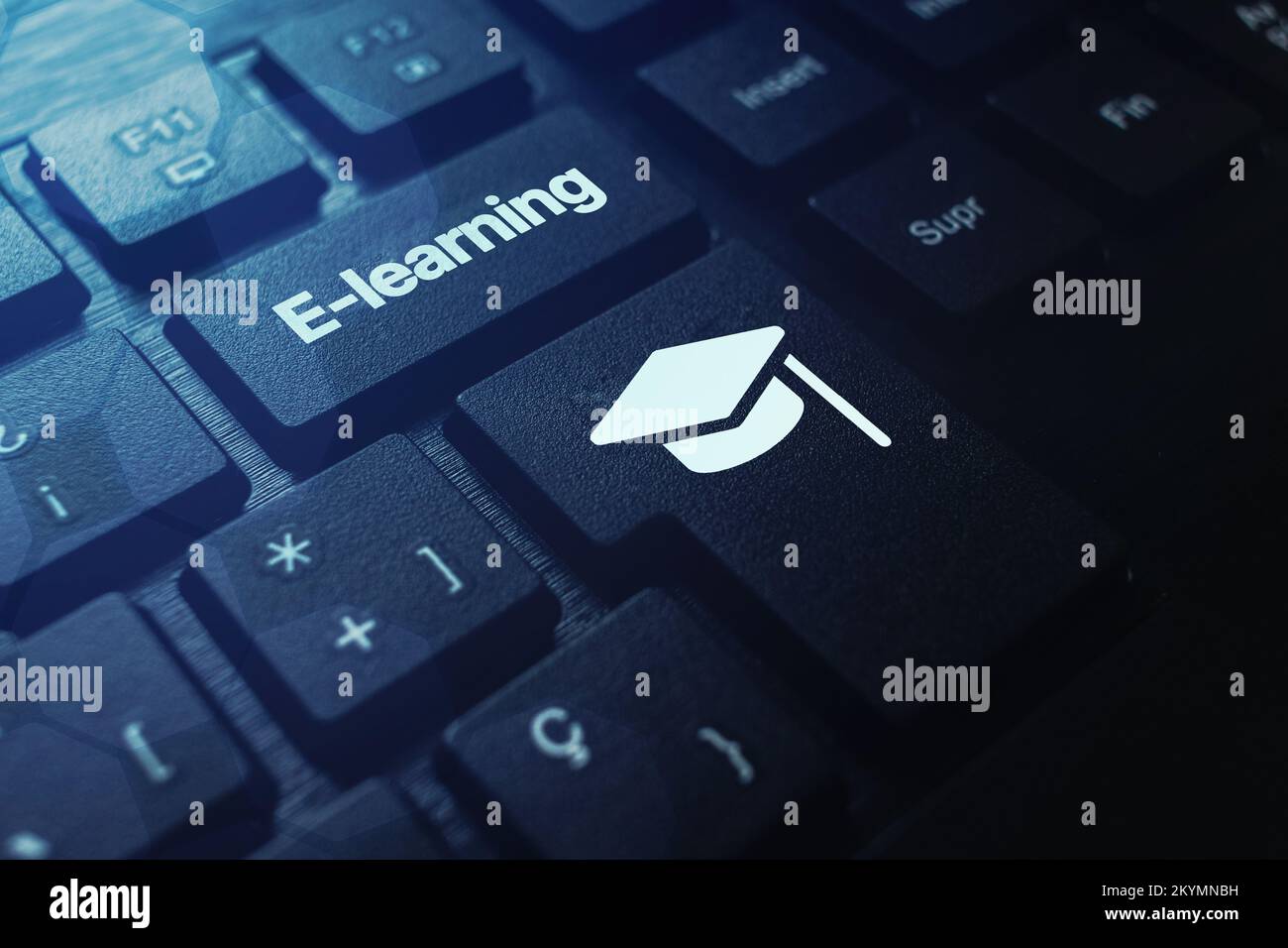 Black keyboard with E-learning word on button and graduation cap ...