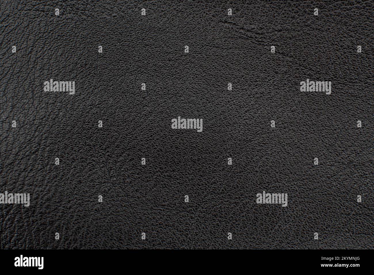 Black leather texture. Abstract background of dark leather with small ...