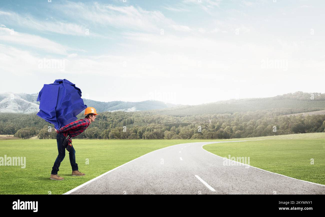 Engineer man carry load Stock Photo - Alamy