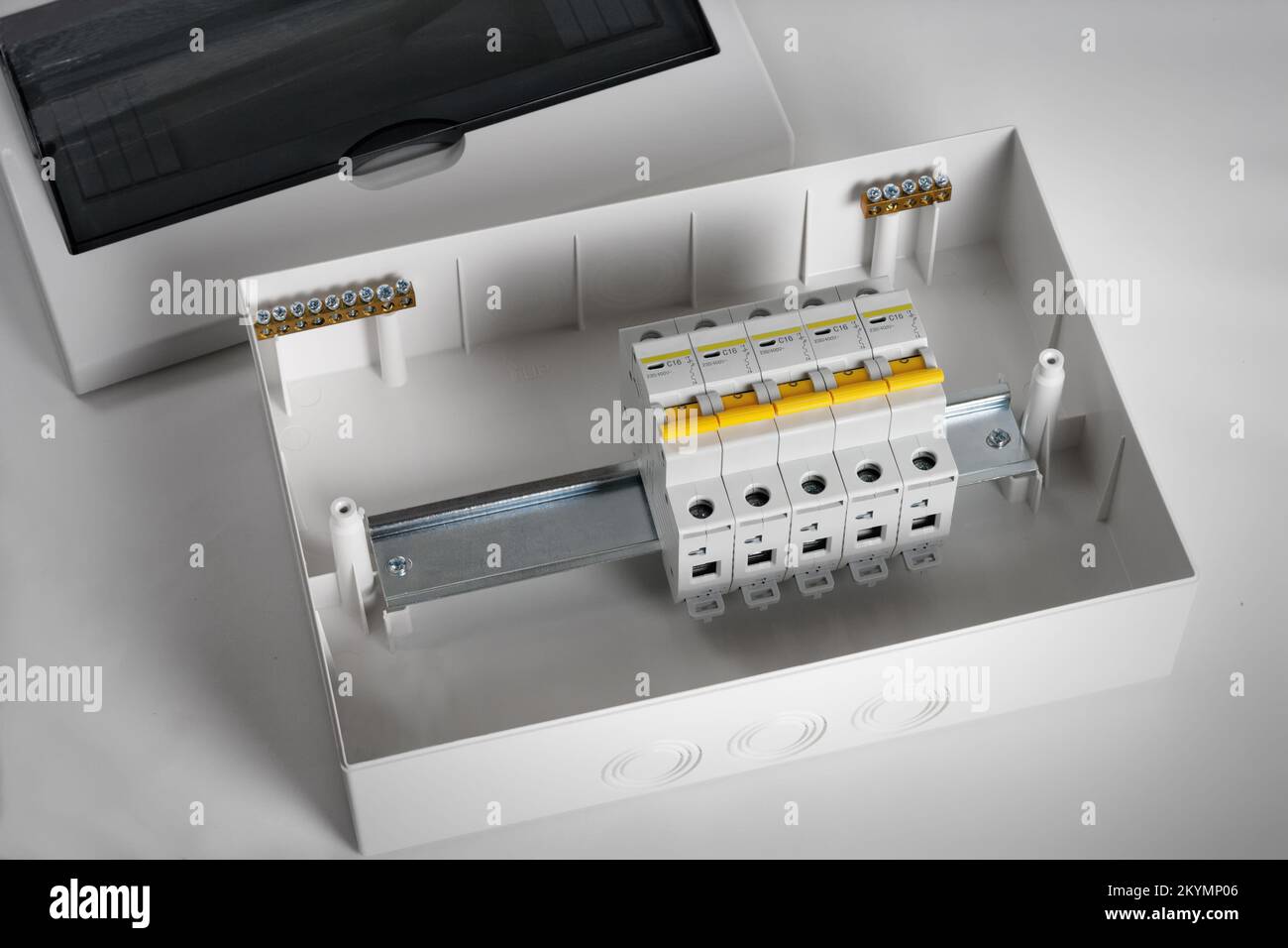 Plastic distribution board. Electrical board. Close-up. Isolated on ...