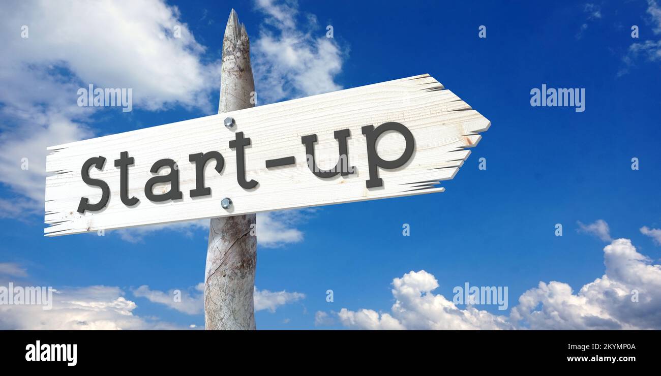 Start-up - wooden signpost with one arrow Stock Photo - Alamy