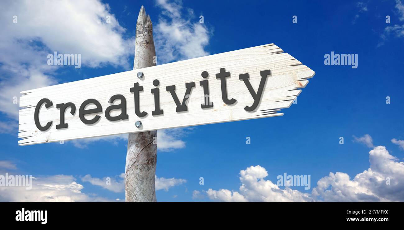 Creativity - wooden signpost with one arrow Stock Photo - Alamy