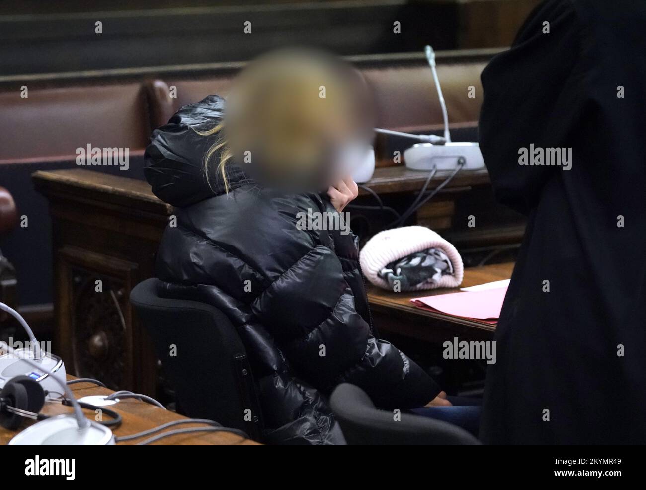Hamburg, Germany. 01st Dec, 2022. The accused wife sits in the ...