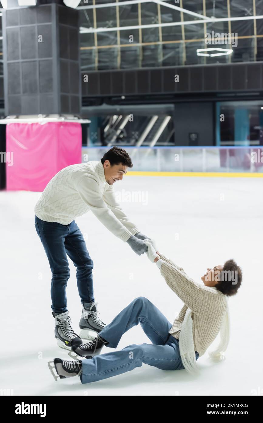 Side view man ice skating hi-res stock photography and images - Alamy