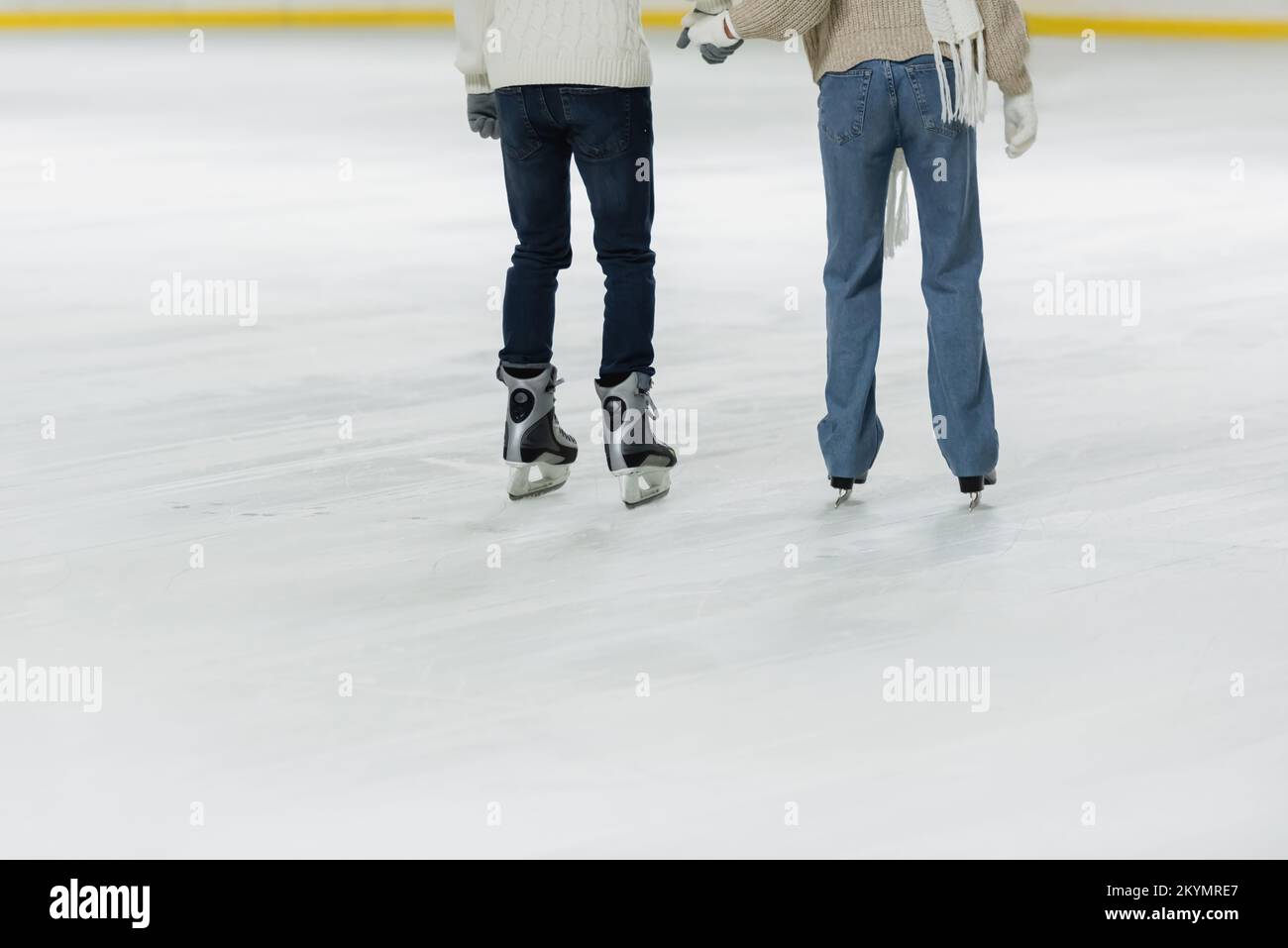 Holding hands ice skating hi-res stock photography and images - Alamy