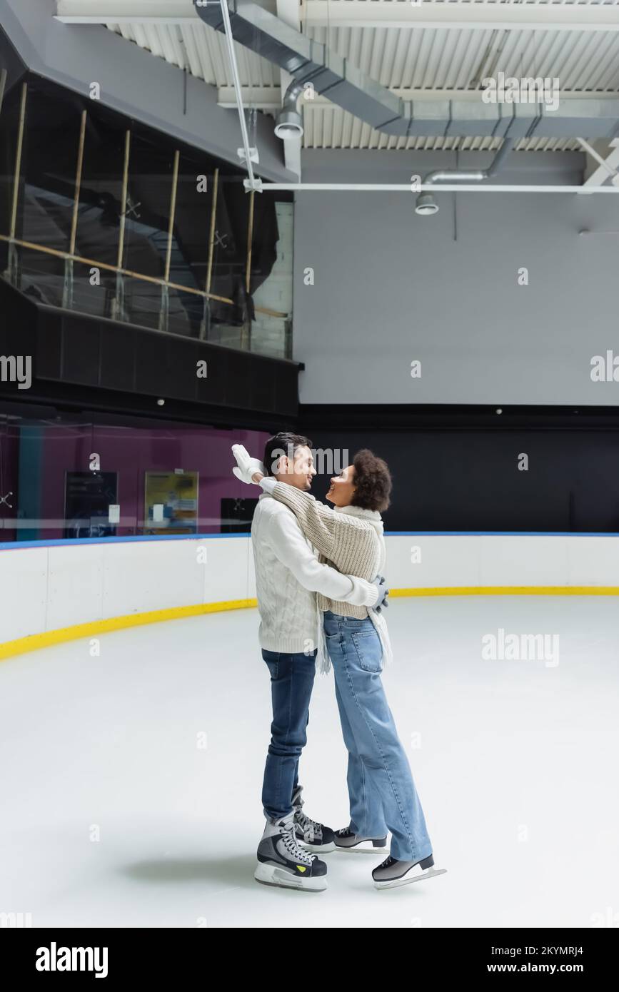 Romantic woman embracing boyfriend on hi-res stock photography and ...
