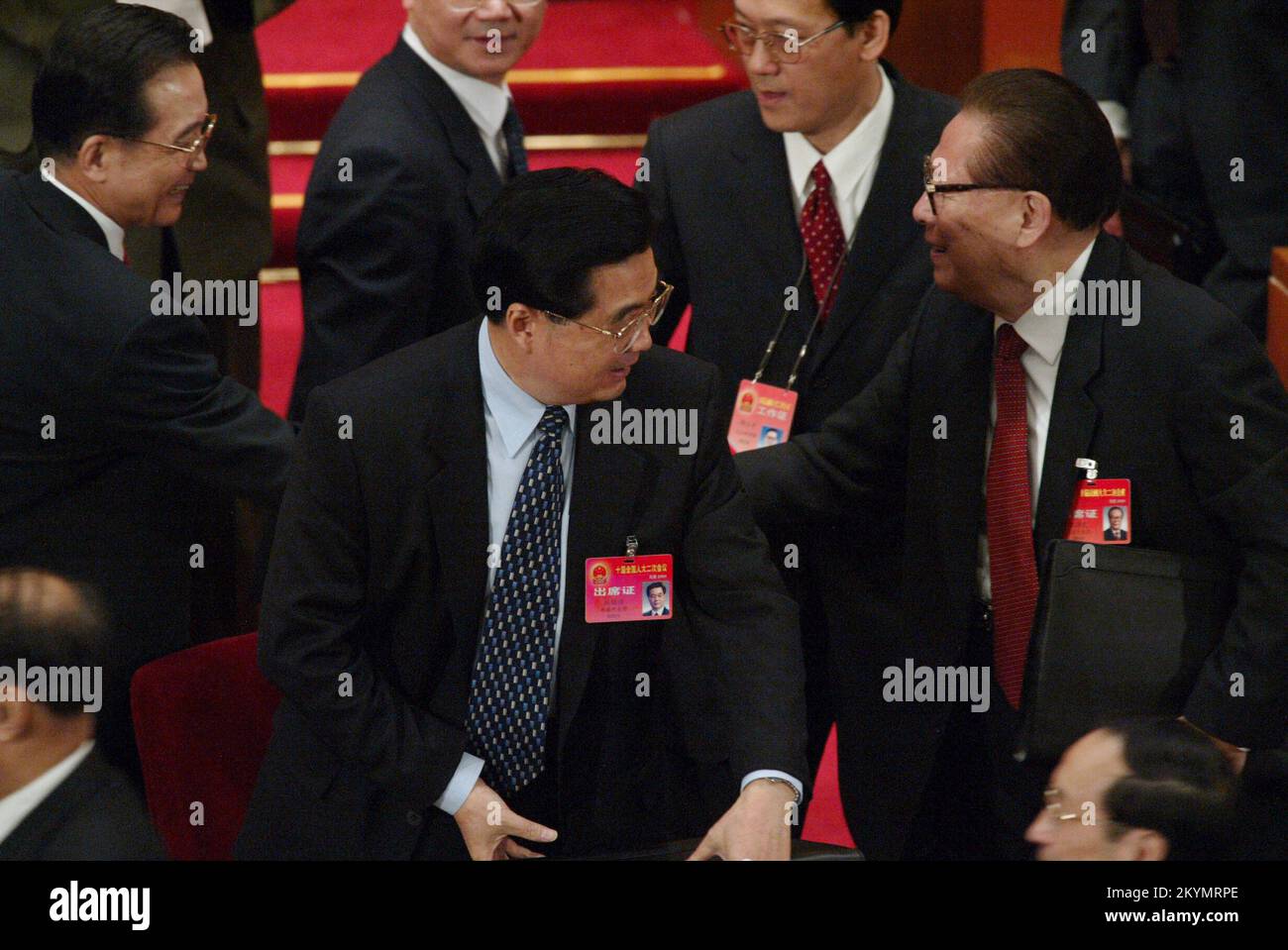 Former Chinese President Jiang Zemin (R) shake hand with Chinese ...