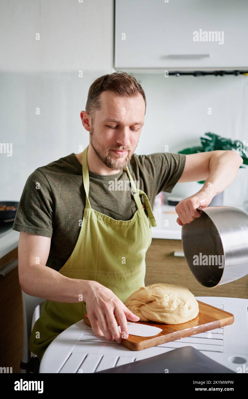 Professional pastry chef rolling dough hi-res stock photography and ...