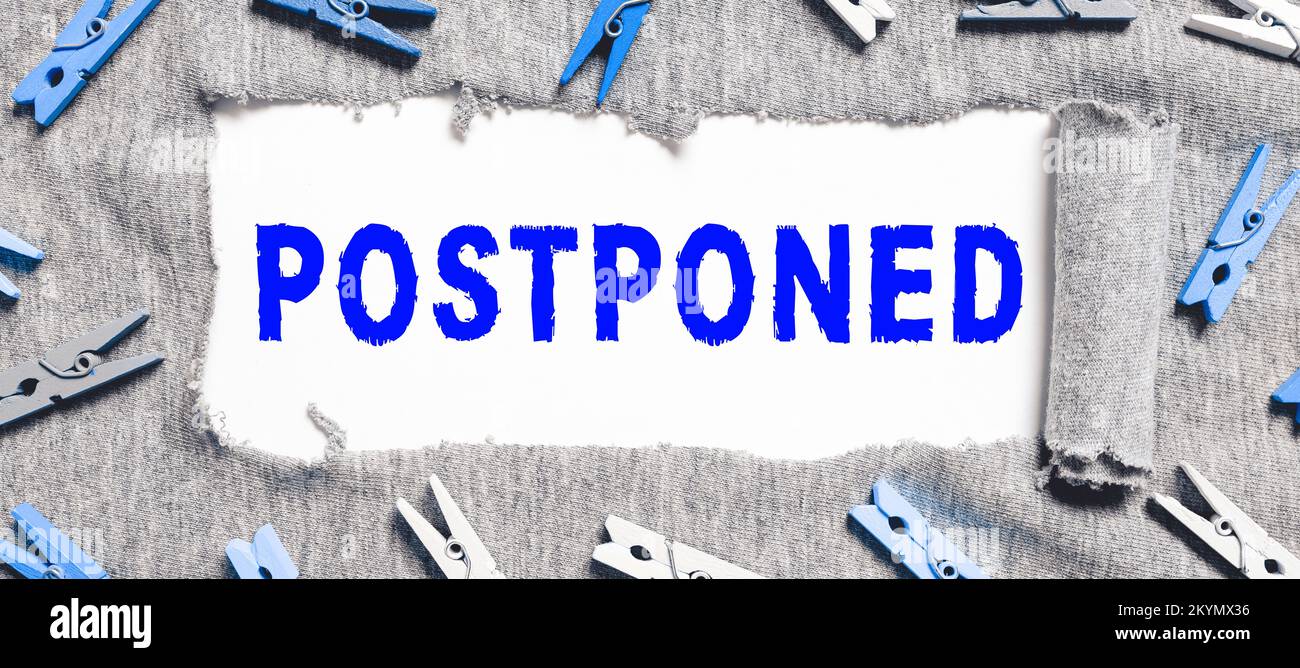 Text caption presenting Postponed. Business approach to place later in ...