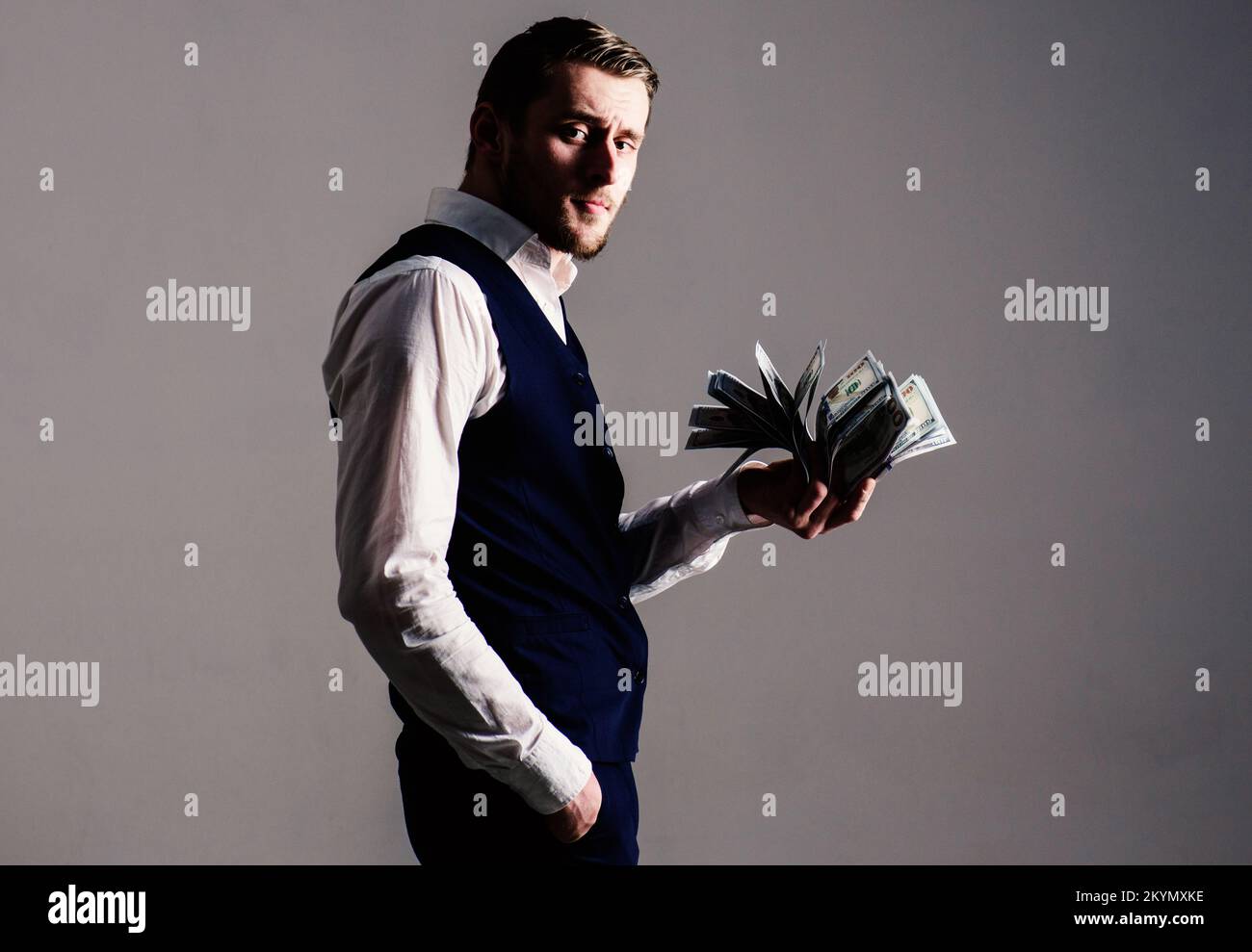 Rich man, successful entrepreneur get cash, banknotes, currency ...