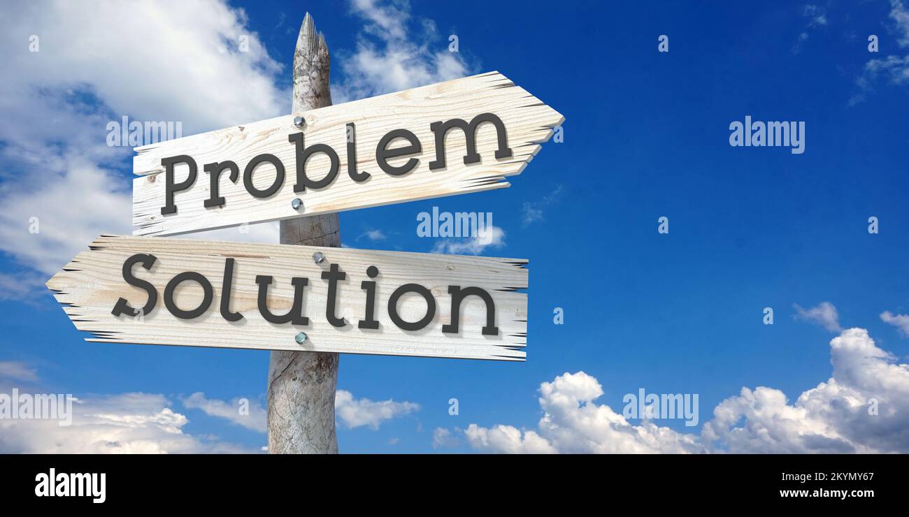 Problem, solution - wooden signpost with two arrows Stock Photo - Alamy