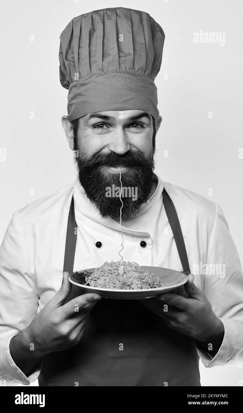 Restaurant cuisine concept. Cook with happy face Stock Photo - Alamy