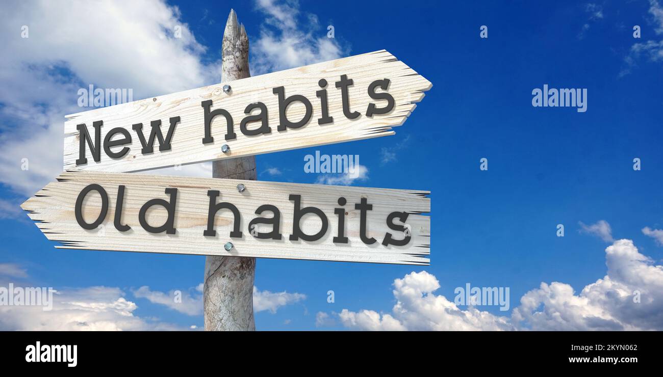 Old habits, new habits - wooden signpost with two arrows Stock Photo ...