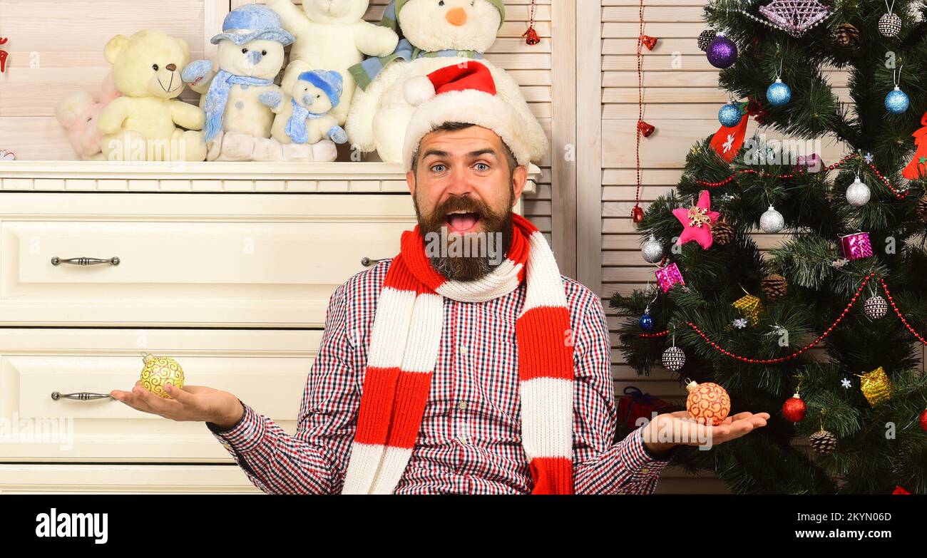 Santa Claus with excited face on Christmas tree background Stock Photo ...