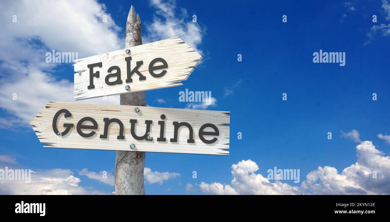 Fake or genuine - wooden signpost with two arrows Stock Photo - Alamy