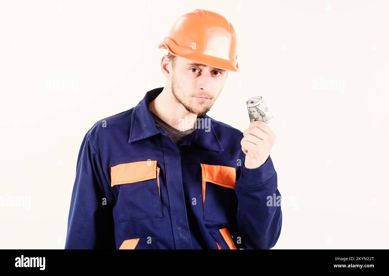 Construction worker making money or being paid on white background ...