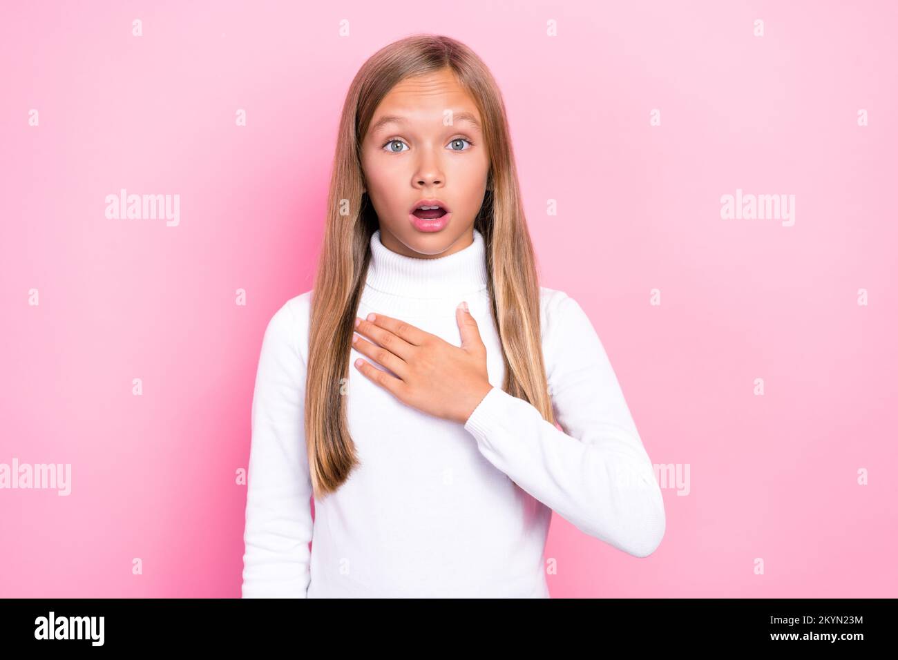 Portrait of speechless shocked girl hand touch chest open mouth ...