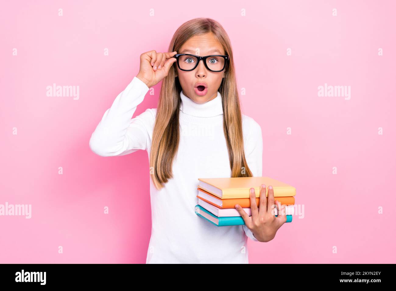 Portrait of impressed speechless schoolkid hand touch eyewear open ...