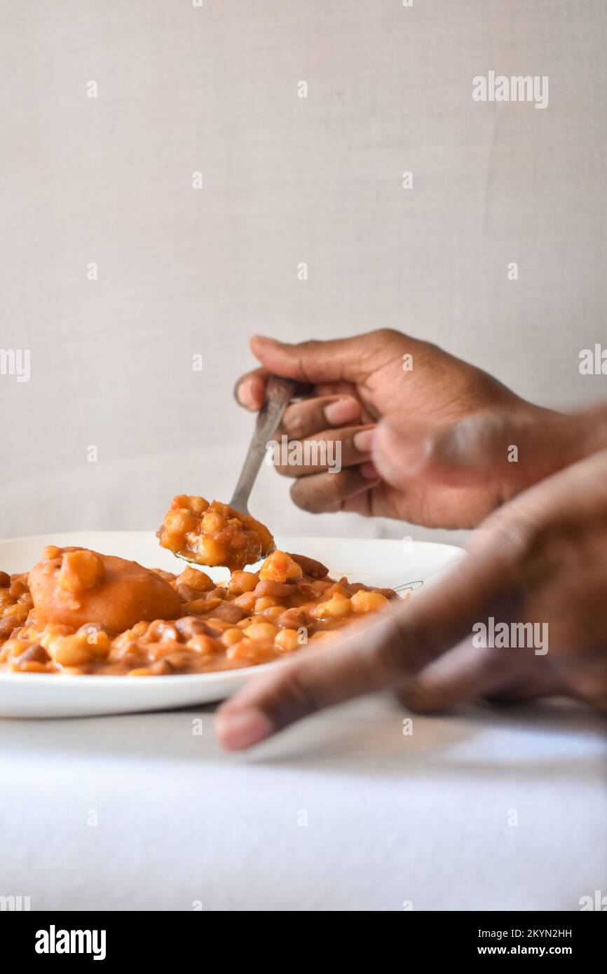 A plate of muthokoi - a kenyan traditional food made from dehusked corn ...