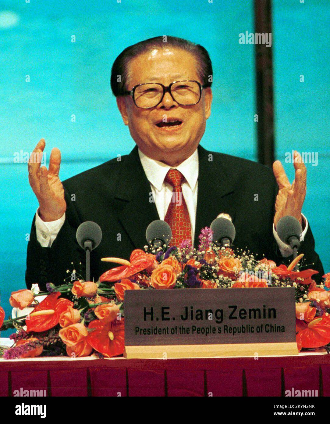 Chinese President Jiang Zemin gestures as he expresses his satisfaction ...