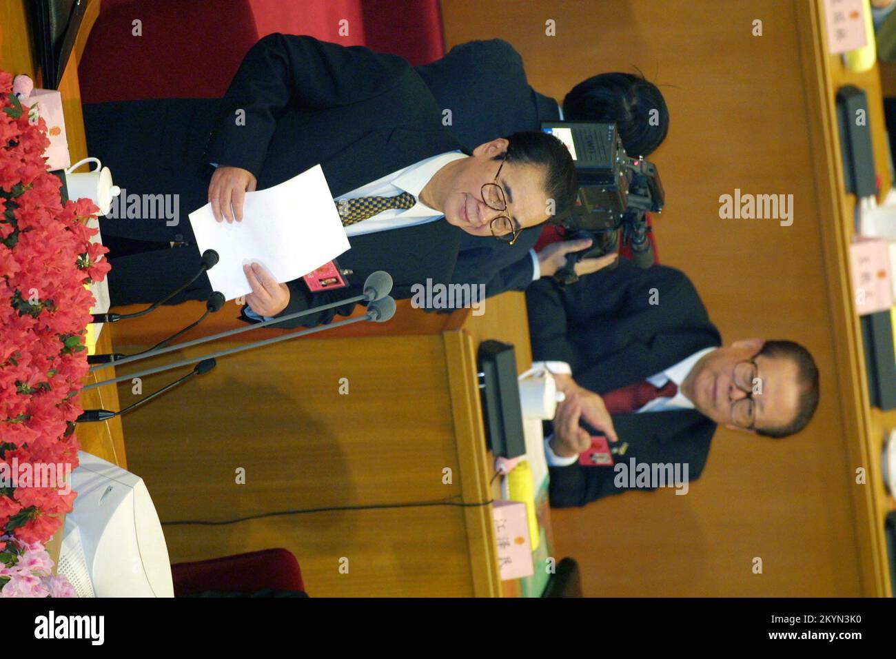 National People's Congress (NPC) Chairman Li Peng (left)announcing the ...