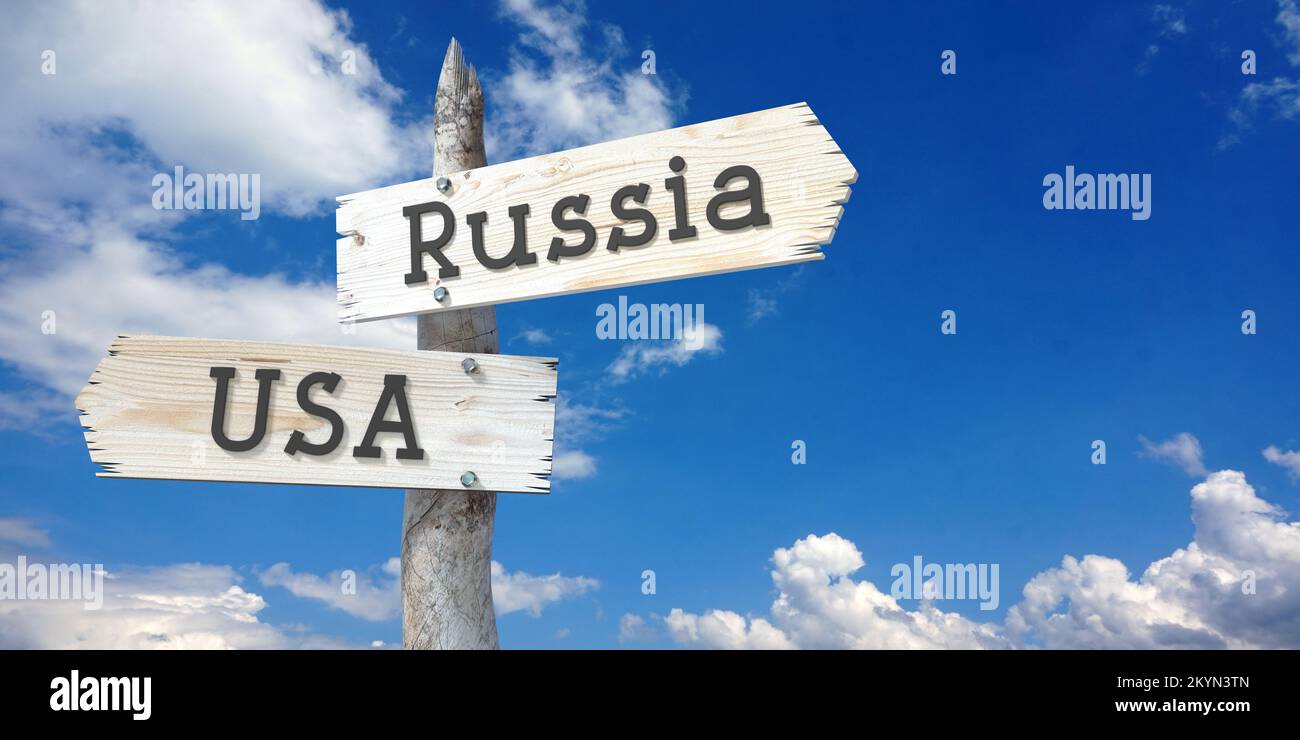 Russia and USA - wooden signpost with two arrows Stock Photo - Alamy