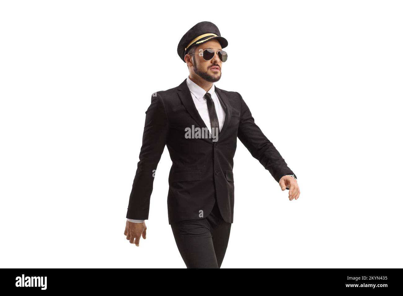 Chauffeur in a uniform walking isolated on white background Stock Photo ...