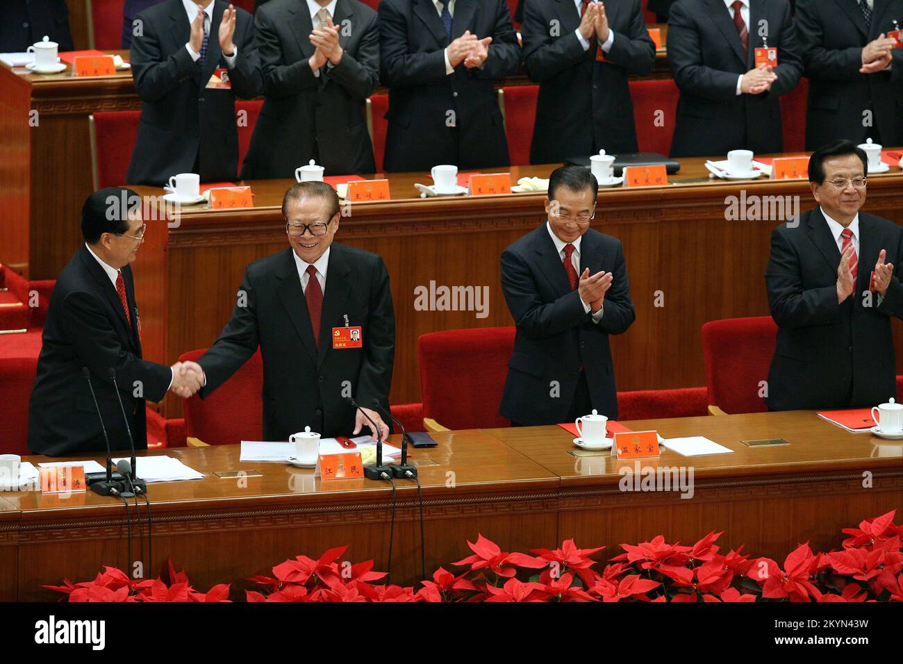 President Hu Jintao (left); shakes hands with former Chinese president ...