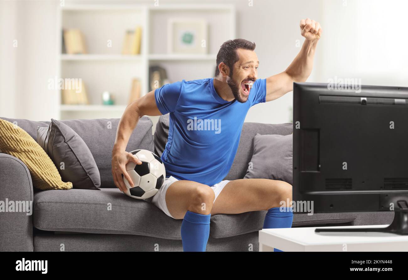 Young adult cheering football game hi-res stock photography and images ...