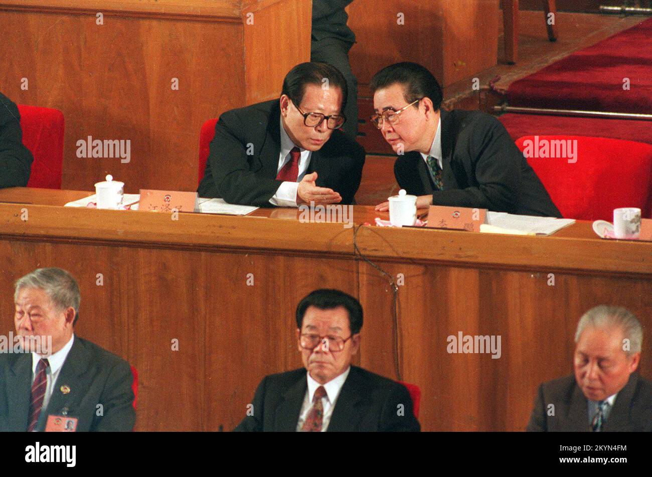 Jiang Zemin (left) and Li Peng talking during the Chinese People's ...