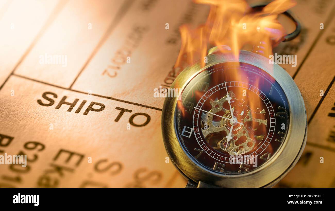 Burning pocket watch on post envelope label Stock Photo - Alamy