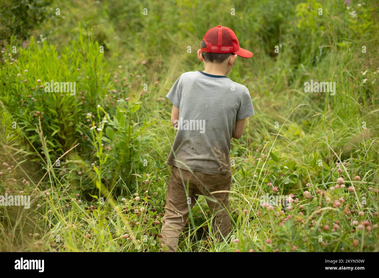 Adorable kid in red shirt hi-res stock photography and images - Alamy