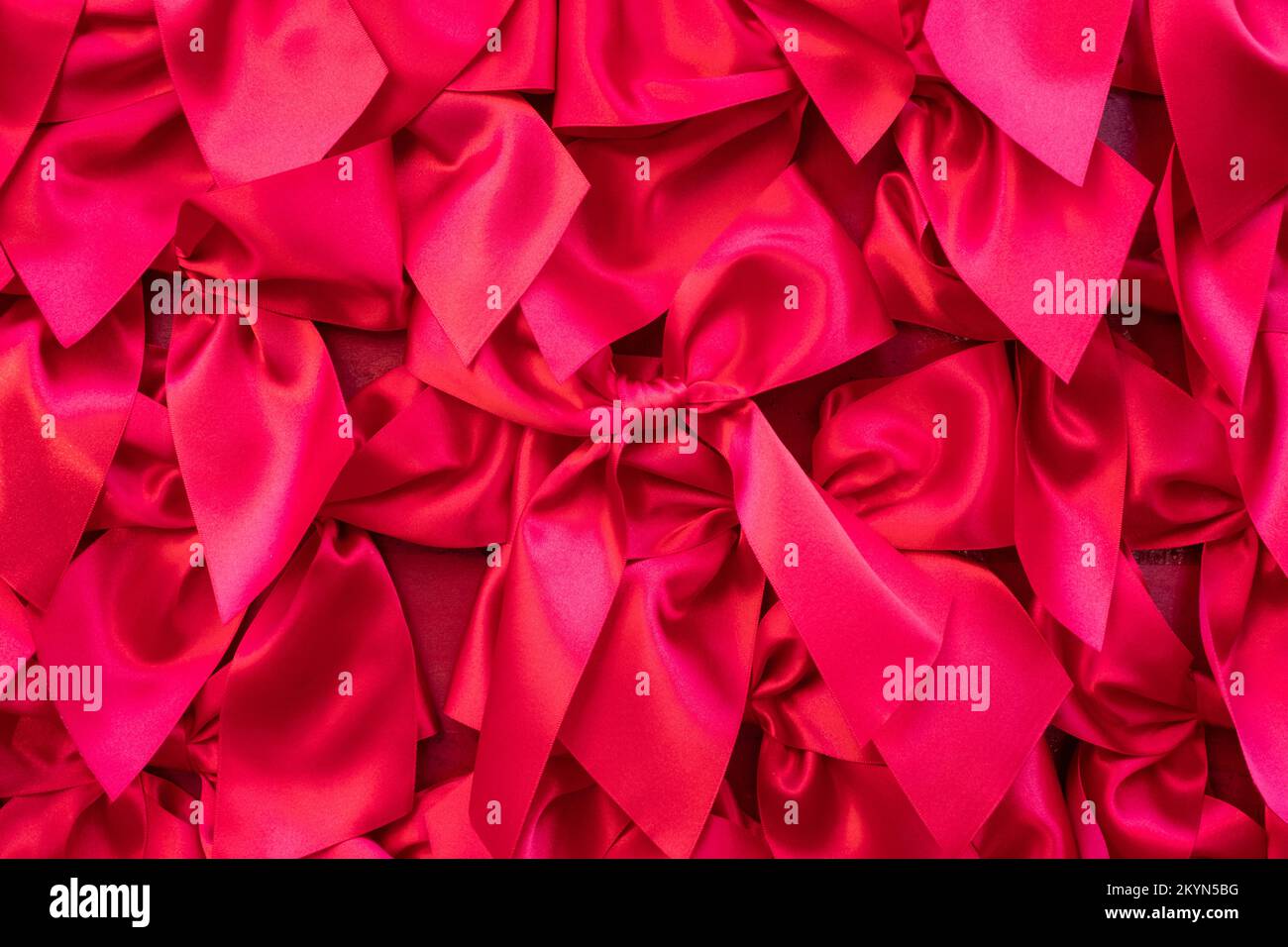 Red ribbon tied in bows decorates haberdashery shop VV Rouleaux in ...