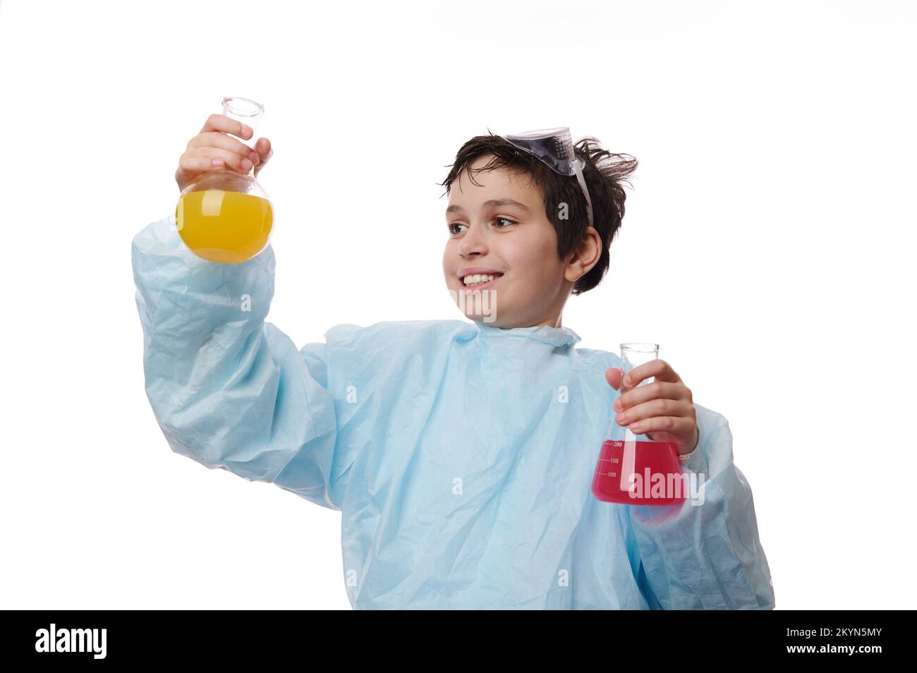 Chemistry lesson. Smart preteen schoolboy, young chemist scientist ...