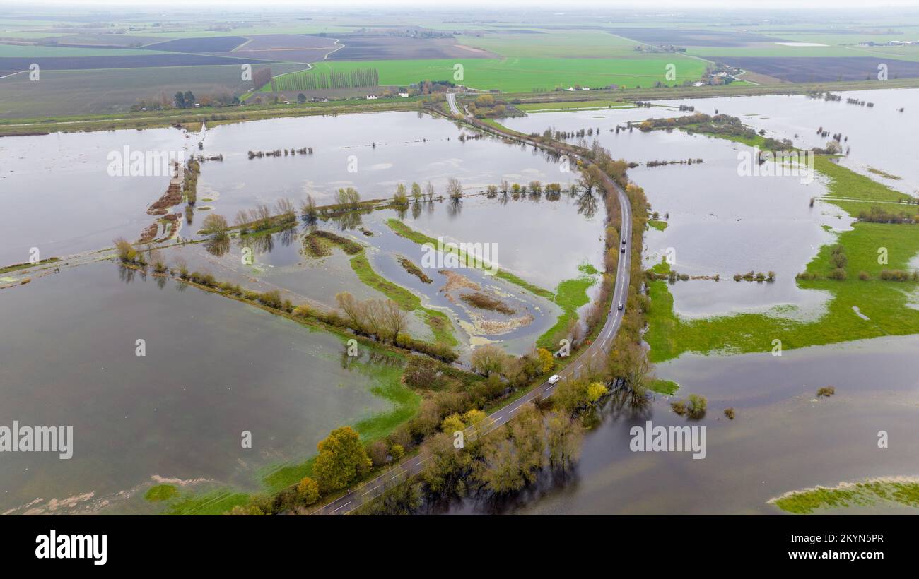 Picture dated November 27th shows the A1101 road surrounded by flooded ...