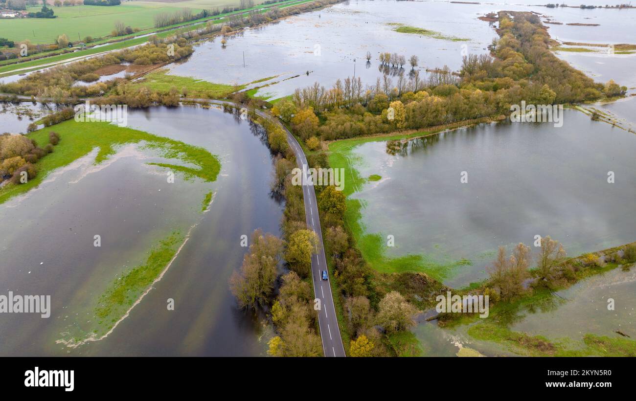Picture dated November 27th shows the A1101 road surrounded by flooded ...