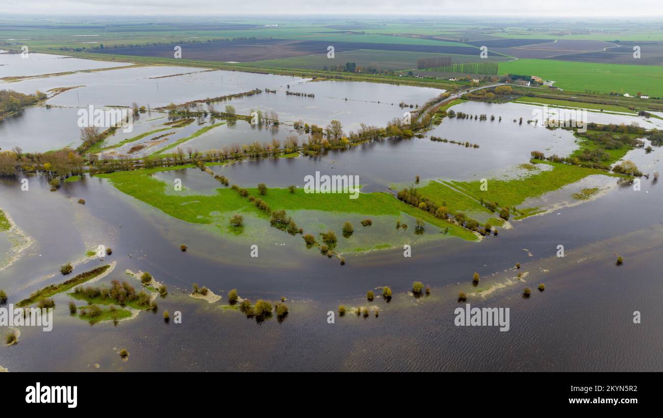 Picture dated November 27th shows the A1101 road surrounded by flooded ...