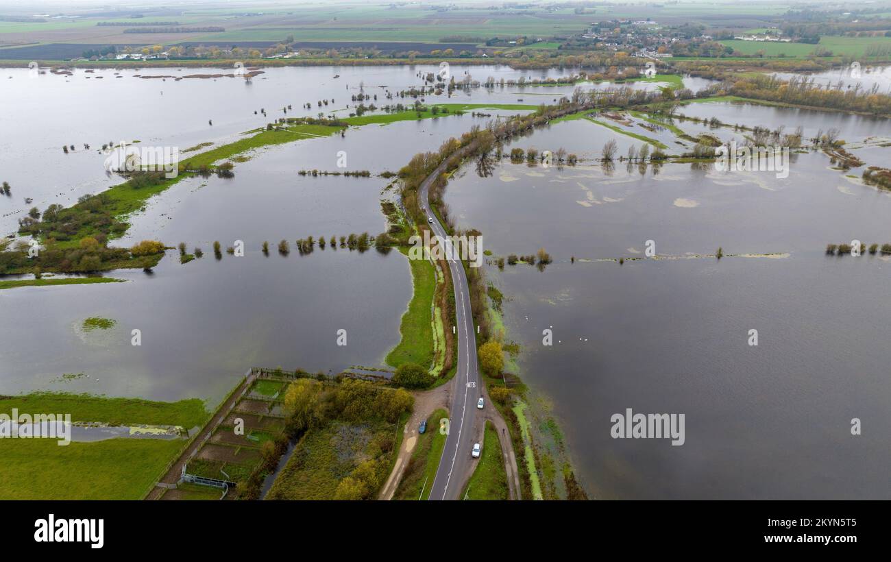 Picture dated November 27th shows the A1101 road surrounded by flooded ...