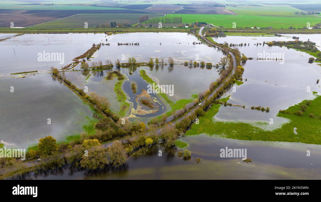 Picture dated November 27th shows the A1101 road surrounded by flooded ...