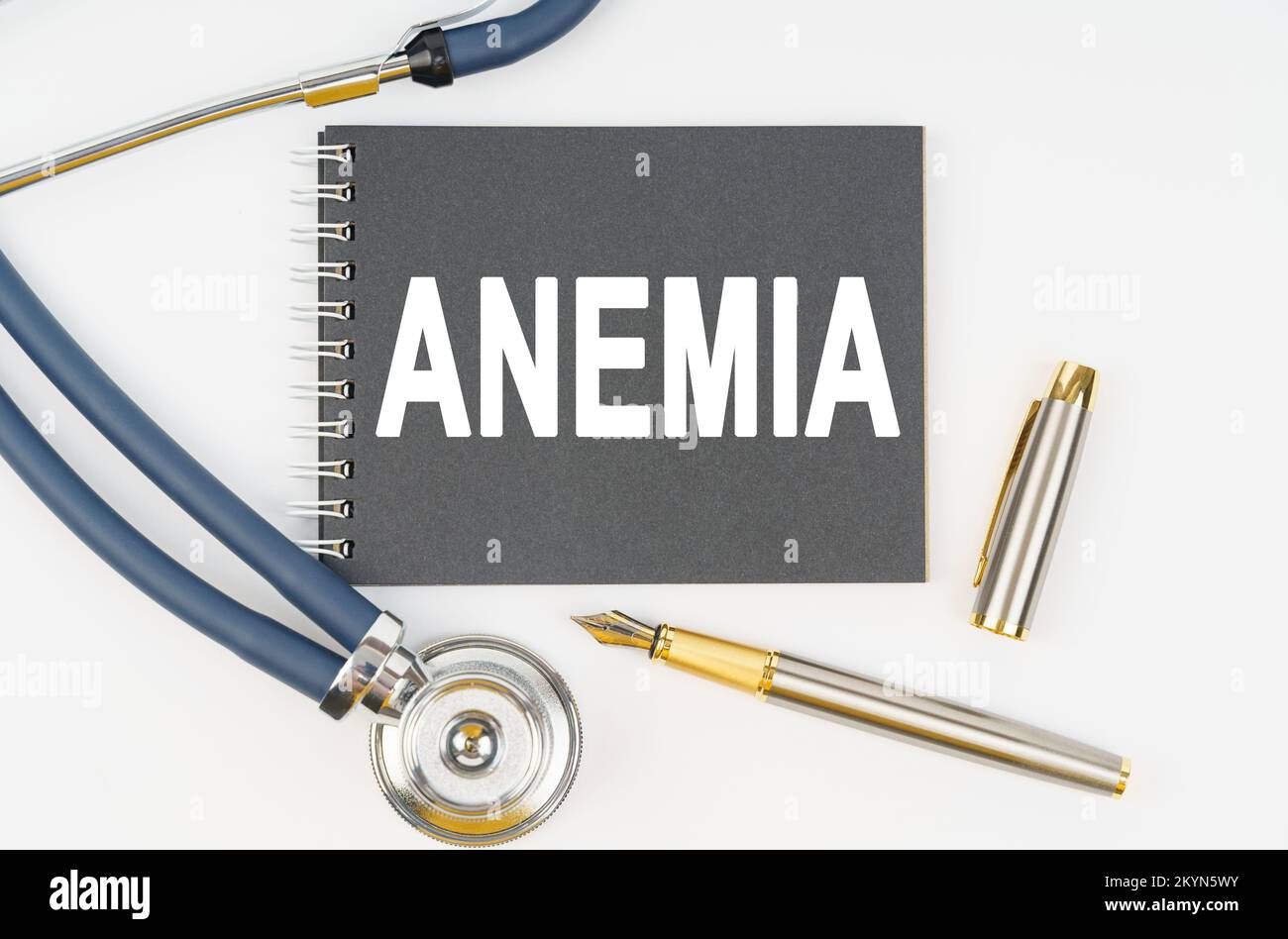 Medicine and health. On a white background lie a stethoscope, a pen and ...