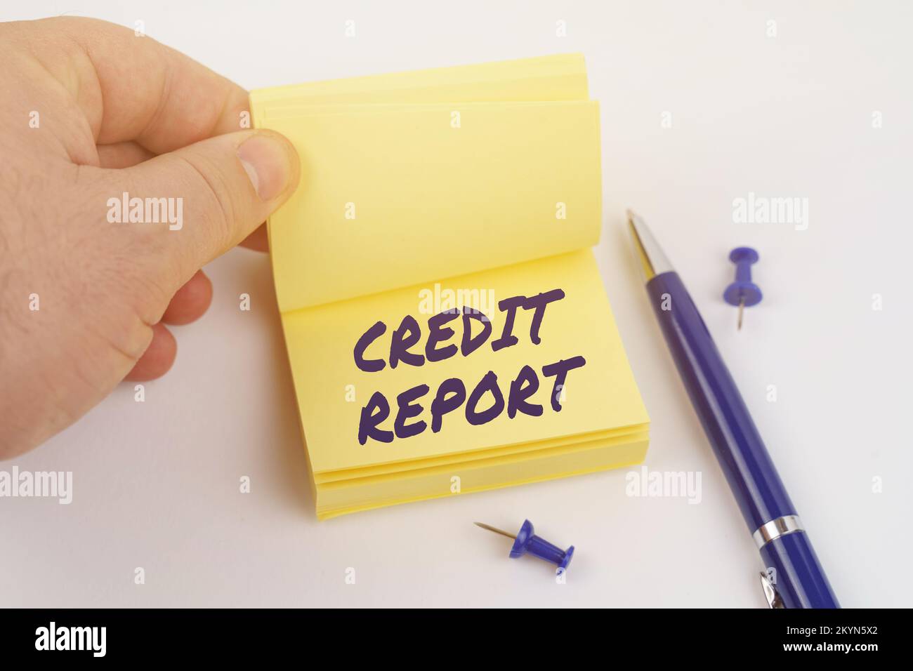 Business and finance concept. The man is leafing through the stickers ...