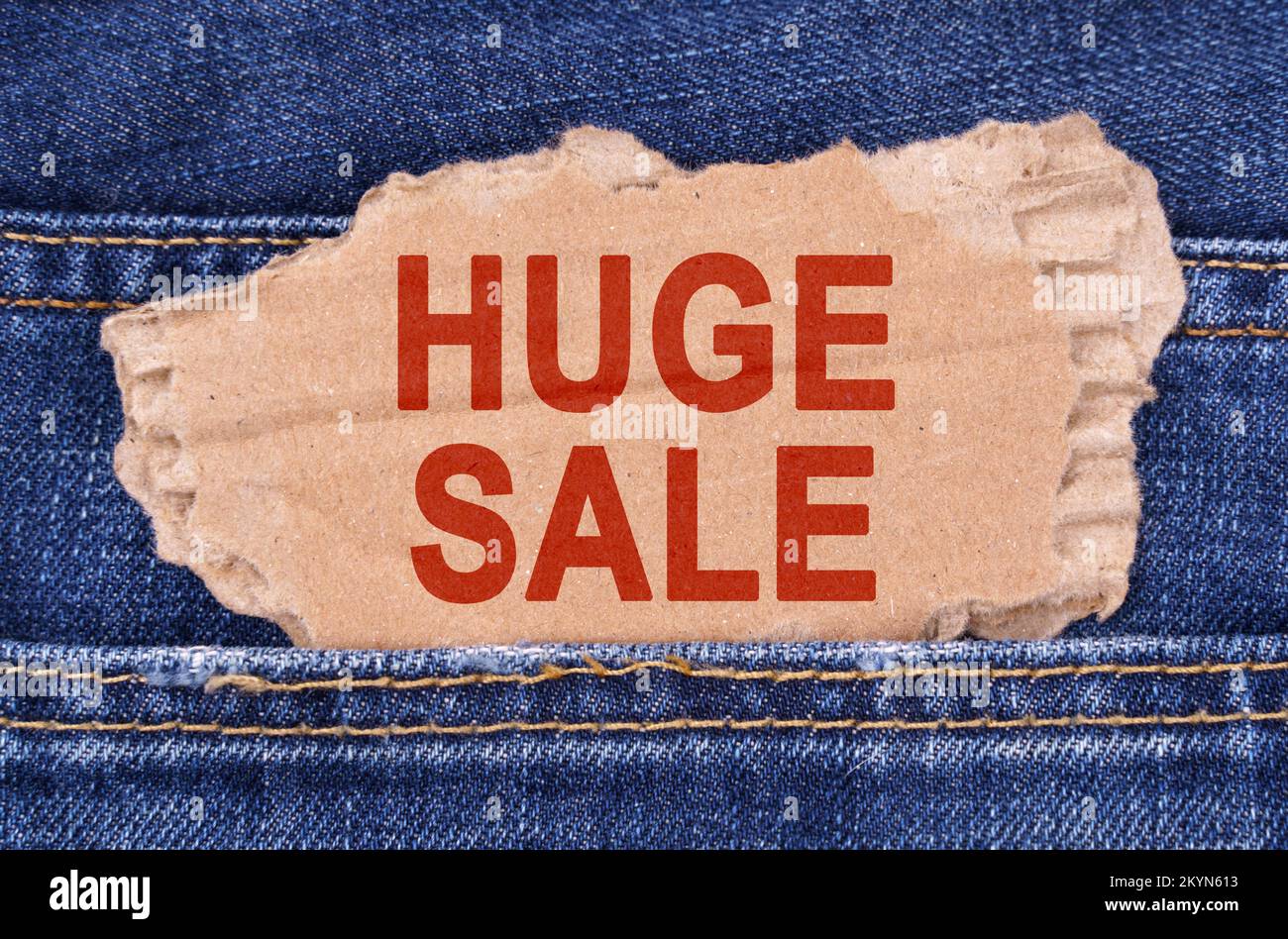 Business and finance. A cardboard box with the inscription- HUGE SALE ...