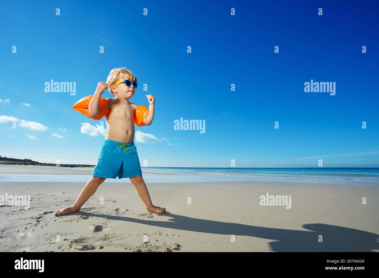 Strong child posing hi-res stock photography and images - Alamy
