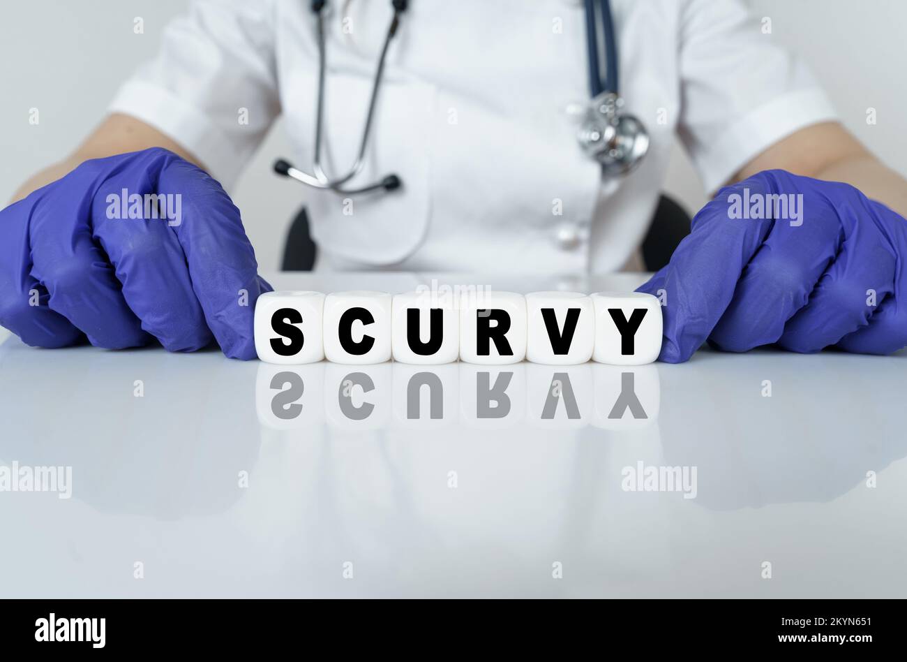 Medicine and health concept. The doctor put together a word from cubes ...