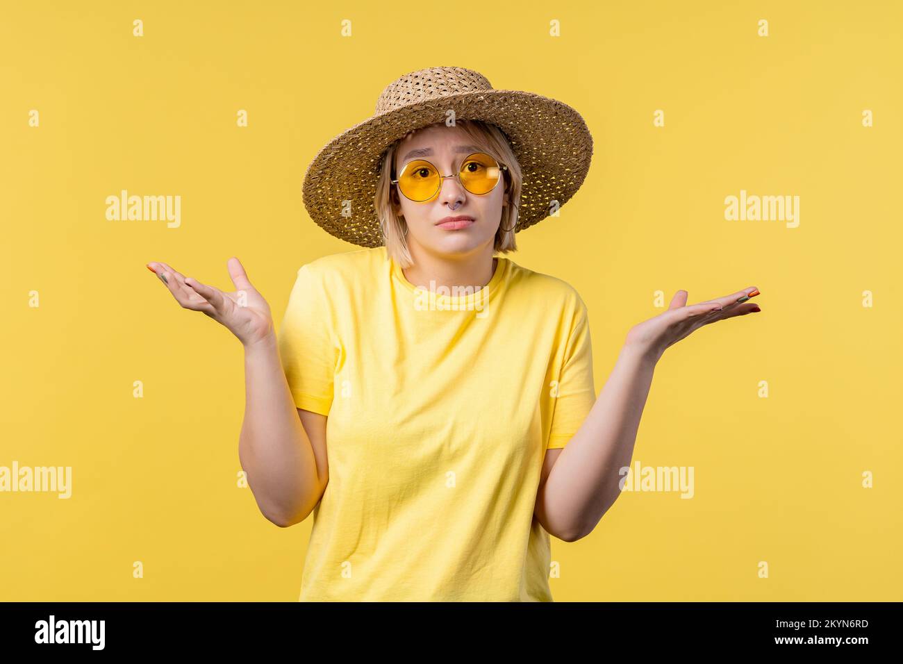 Confused pretty woman, shoulders up - can't help, makes gesture of I ... Confused pretty woman, shoulders up - can't help, makes gesture of I ...