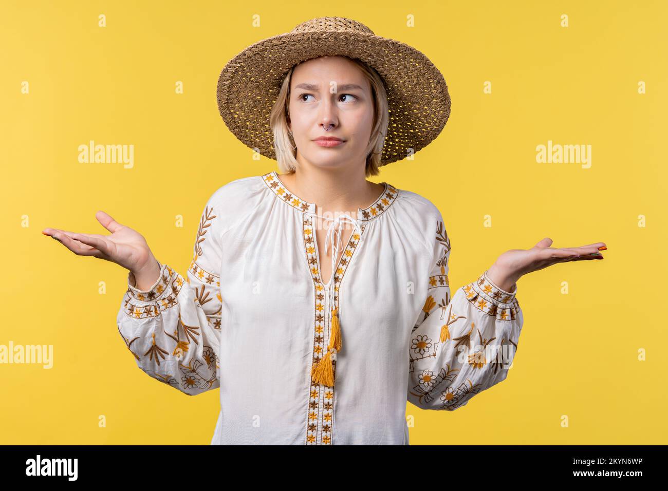 Confused ukrainian woman, shoulders up - can't help, makes gesture of I ... Confused ukrainian woman, shoulders up - can't help, makes gesture of I ...